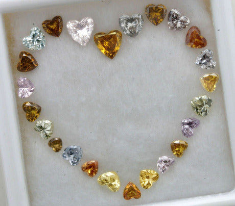 A "valentine-heart" made with heartshape diamonds in different colours